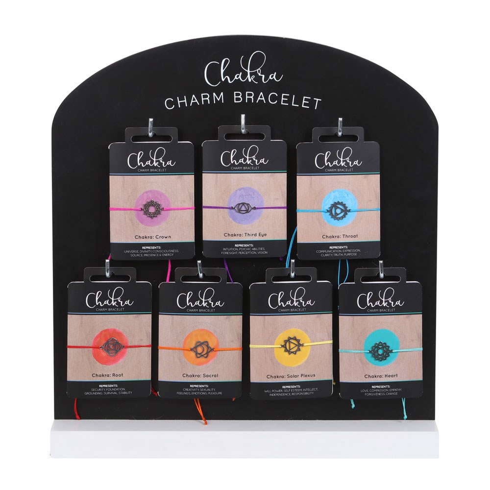 Set of 49 Chakra Charm Bracelets on Display | CREOATE